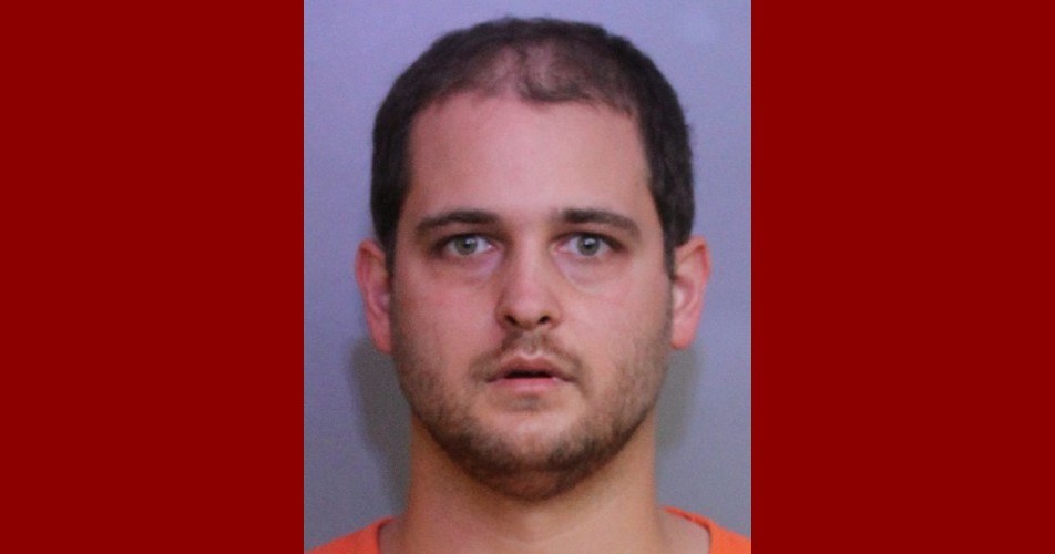 PAUL CORRIGAN booked for