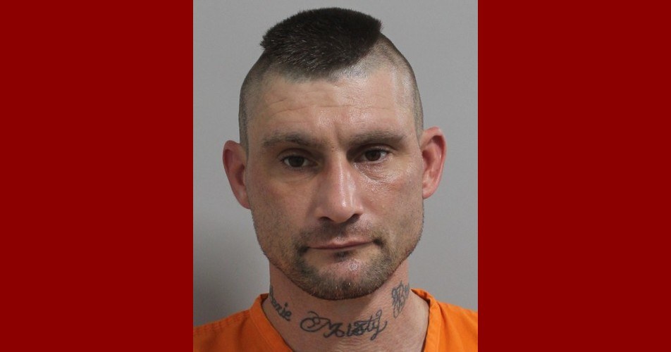 JUSTIN BARKER booked for