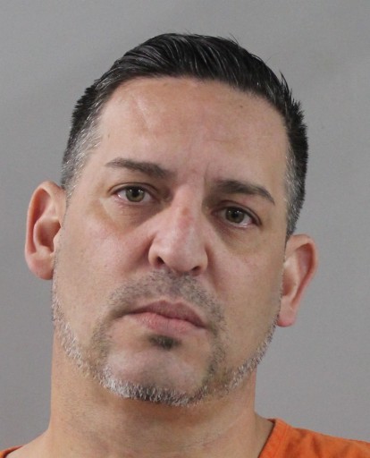 JUAN FLORES booked for