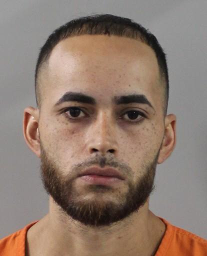 EDUARDO ROMAN-COLON booked for