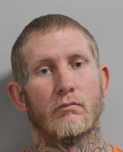 TONY BARRETT booked for