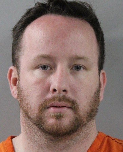 BRIAN CARROLL booked for