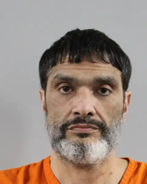 ALEX CARDONA-SAINTIAGO booked for