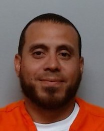 REGGIE CABAN booked for