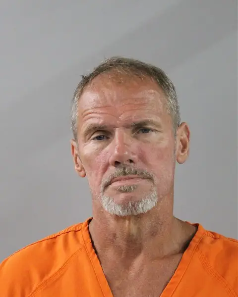 MICHAEL BURKETT booked for 0.00