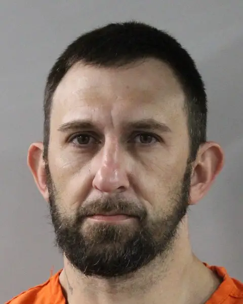 SEAN GRIFFIS booked for 0.00