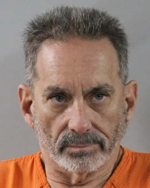 TERRY HARTLEY booked for 5000.00