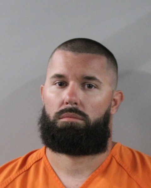 TRAVIS WOOD booked for 0.00