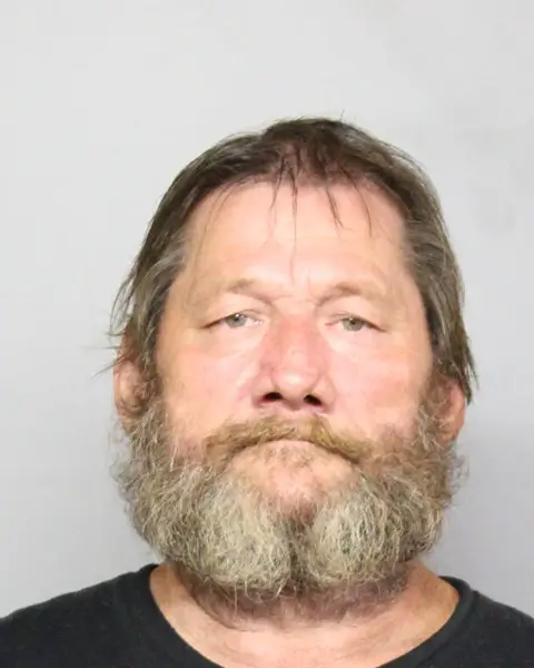 COLIN KNOWLES booked for