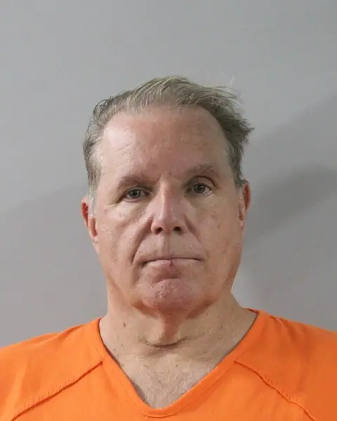 DOUGLAS MILLER booked for 0.00
