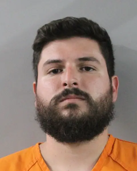 NICHOLAS DAVIS booked for 250.00