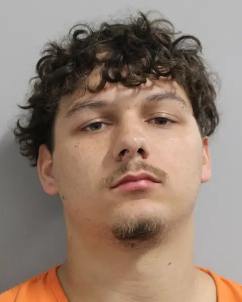 CHRISTIAN LASAINE-SCARBOROUGH booked for