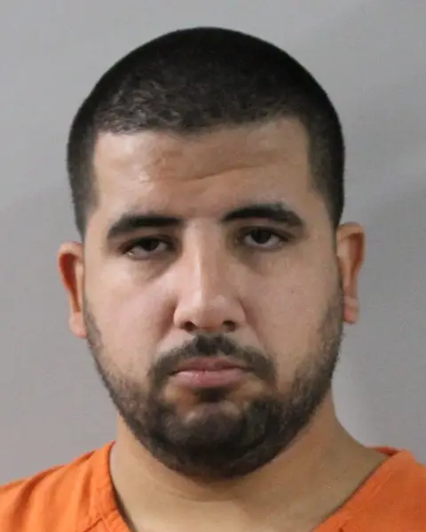 CAIQUE GOMES-SANTOS booked for