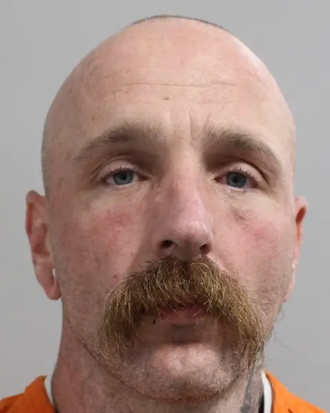 MICHAEL COX booked for